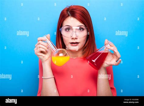 Conceptual Image Of Scared Confused Nerd Woman With Two Tubes Of Stock Photo Alamy