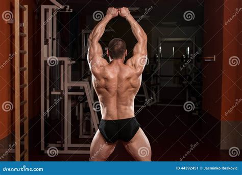 Bodybuilder Performing Rear Double Biceps Pose Stock Image Image Of Bodybuilding Athlete