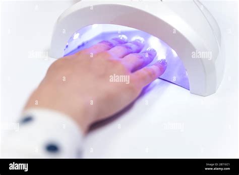 Professional Ultraviolet Lamp Being In Use For Client Stock Photo Alamy