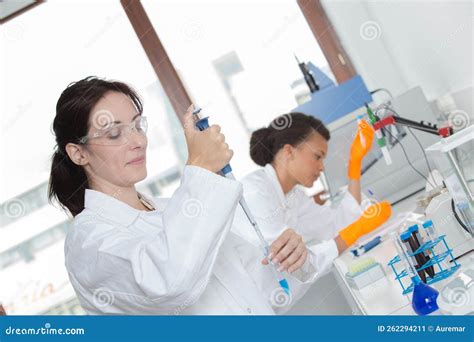 Two Young Female Scientist Doing Experiments In Lab Stock Image Image Of Serious Biology