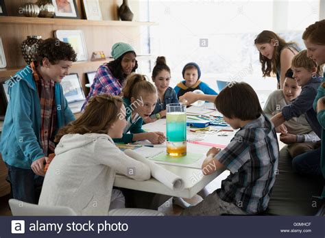 Babes And Girls Conducting Science Experiment Dining Table Stock Photo Alamy