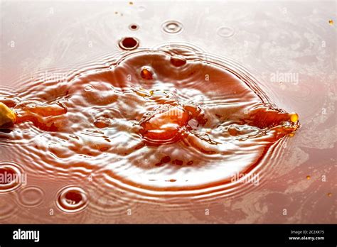 Rusty Water Drops Splashing In Dirty Oily Water Drops Of Stagnant Water Stock Photo Alamy