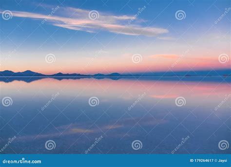 Sunrise On Salar De Uyuni In Bolivia Covered With Water Salt Flat