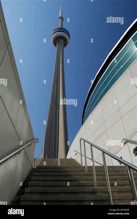Cn Tower Over Stairs Between Walls Of Metro Toronto Convention Center