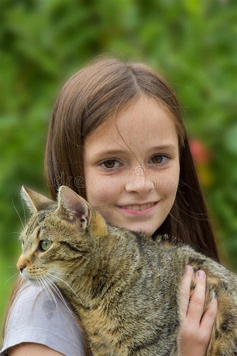 Cute Teenage Girl Cuddles With Her Cat Stock Image Image Of Cute