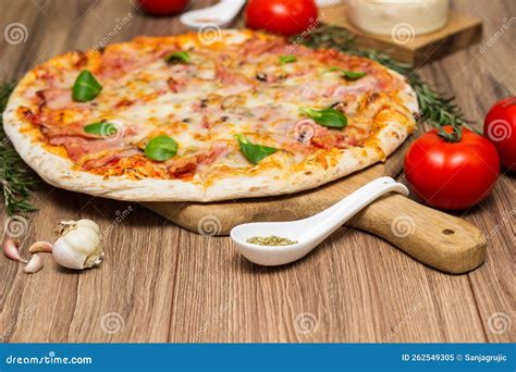 Freshly Baked Pizza With Ham Tomato And Cheese Stock Image Image Of