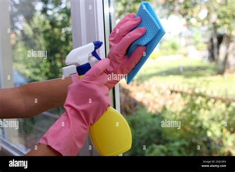 Woman Cleaning Windows Stock Photo Alamy