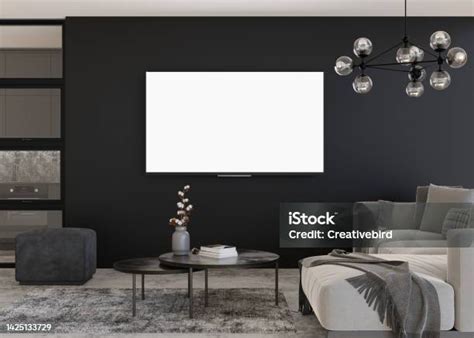 빈 흰색 화면이있는 Led Tv로 집 벽에 매달려 있습니다 Tv 모형 광고 영화 앱 프리젠 테이션을위한 공간을 복사하십시오