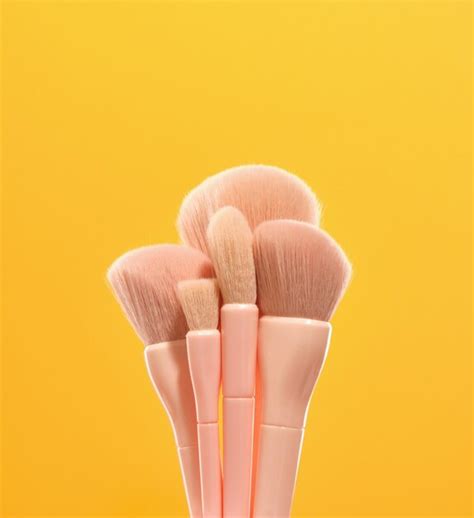 Premium Photo A Set Of Nude Makeup Brushes Creating A Creative Fashionable Look