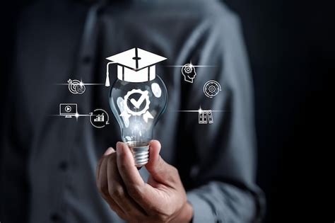 Premium Photo Hand Hold Light Bulb Elearning Program Certificate And Online Education Learning