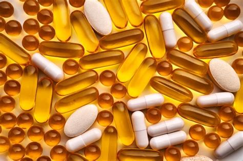 Premium Photo Background Of Tablets Mainly Vitamins And Dietary