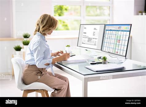 Woman Analyzing Digital E Invoice Using Online Software Stock Photo Alamy