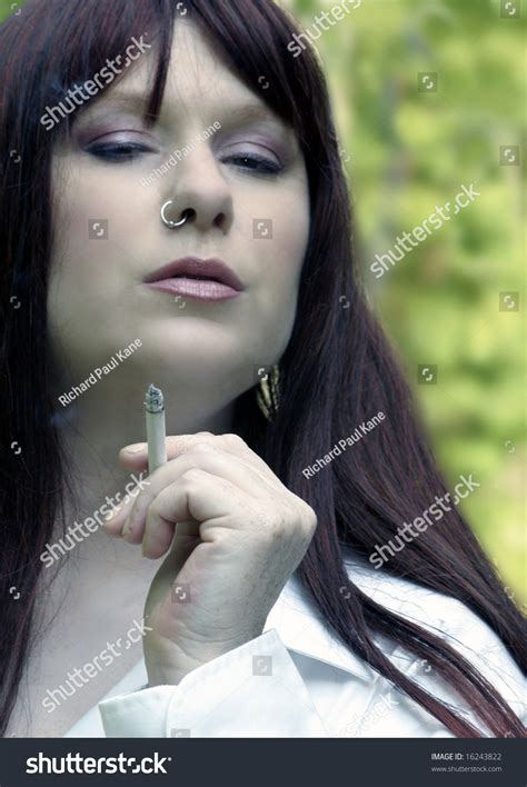 Beautiful Redhead Woman Smoking A Cigarette Nose Ring Stock Photo Shutterstock