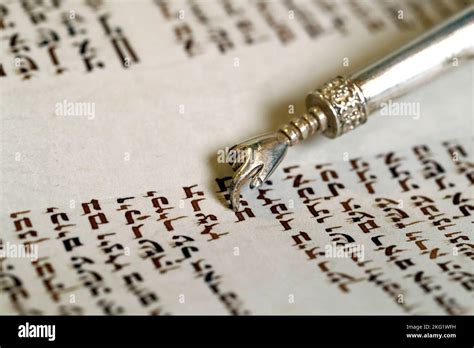 Close Up Detail Of Traditional Torah Scroll Book And Yad In Synagogue Torah Reading The Ten