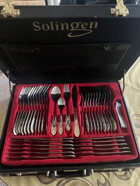 Комплект прибори за хранене със златен орнамент Solingen 84 части в куфар Съдове Серв