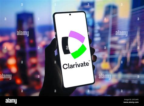 In This Photo Illustration The Clarivate Analytics Logo Is Displayed On A Smartphone Screen