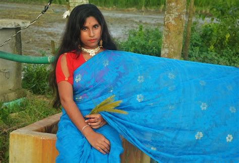 Premium Photo Portrait Of Girl Wearing Sari Sitting Outdoors