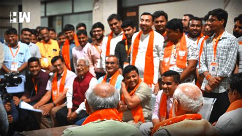 Gujarat Pm Modi Surprises Bjp Workers At Kamalam Enjoys Light Chat