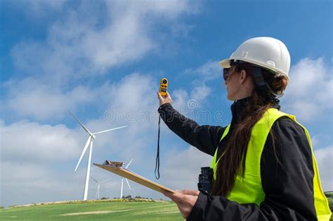 Female Engineer Measuring Wind Speed At Wind Turbine Farm Stock Image Image Of Environment