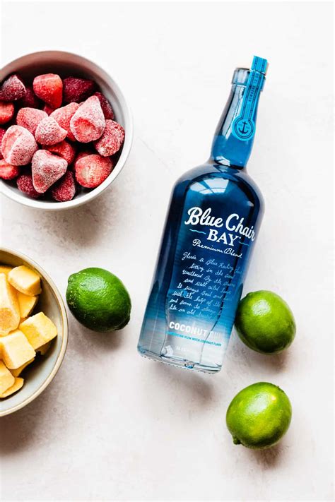 Frozen Coconut Rum Punch With Strawberry Mango And Lime Blue Bowl