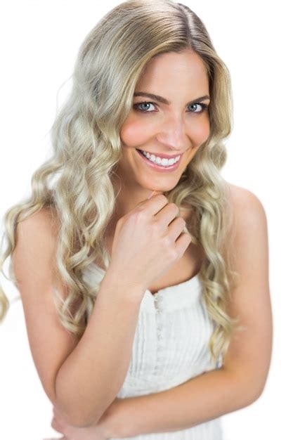 Premium Photo Cheerful Curly Haired Blonde Smiling