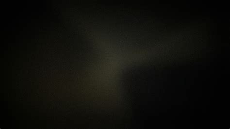 짙은 검정색과 올리브 색조가 거친 질감을 특징으로 하는 미묘하고 어두운 4k 그라디언트 배경입니다 우울하고 세련된 시각 효과를