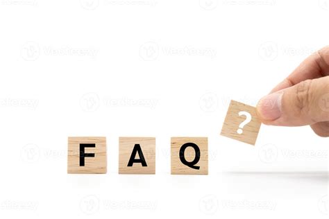 Hand Place Wooden Blocks With Faq Text Isolated On White Background