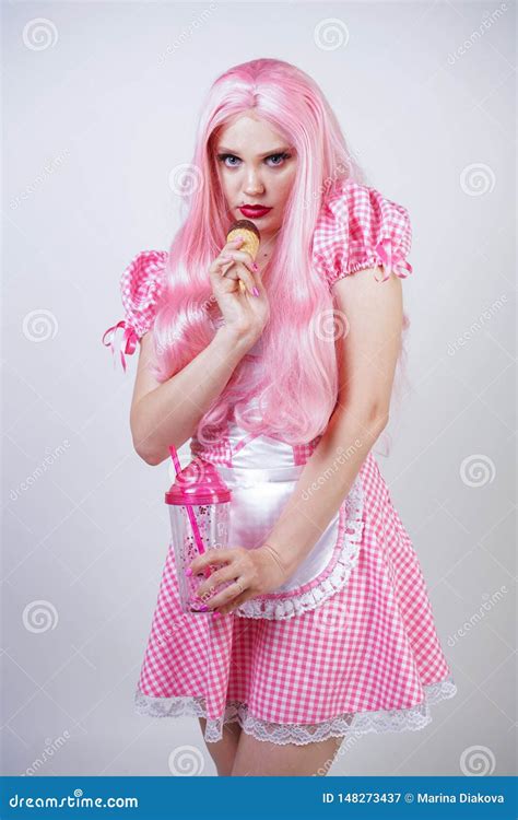 Erotic Caucasian Chubby Girl In Pink Plaid Doll Dress Holds Delicious Summer Ice Cream And