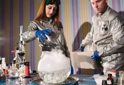 Experiments In A Chemistry Lab Conducting An Experiment In The Laboratory Stock Photo Image