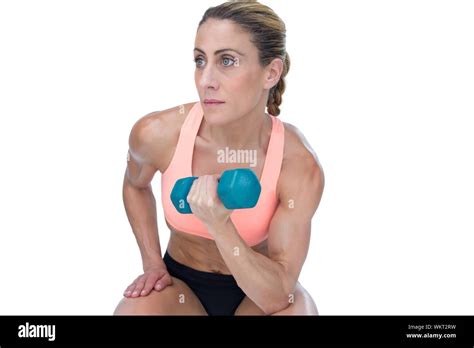 Strong Woman Doing Bicep Curl With Blue Dumbbell On White Background Stock Photo Alamy