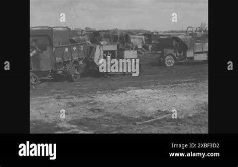 1918 American Soldiers Operate A Small Ford Tractor To Haul Boxes