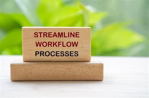 Simplify Workflow Processes Text On Wooden Blocks Representing Continuous Improvement Approach