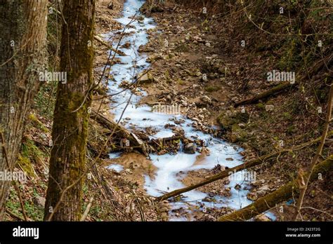 A Stream In A Ravine Of White And Blue Color Environmental Pollution