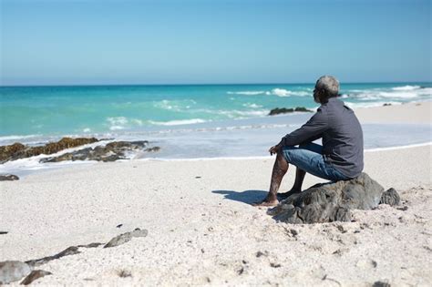 Premium Photo Side View Of A Senior African American Man Sitting On A