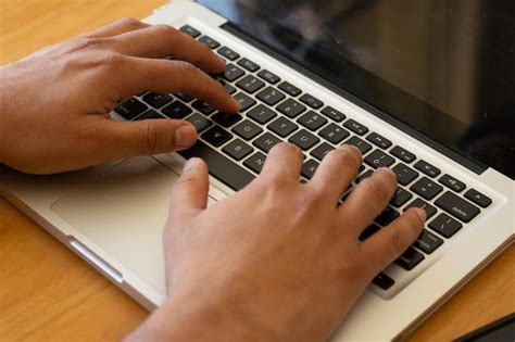 Premium Photo Hands Typing On Laptop Keyboard Closeup Of Hands Typing And Pointing At A