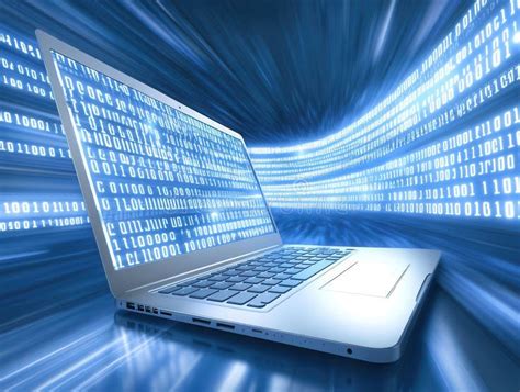 Laptop Displaying Binary Code In Futuristic Cyberspace Tunnel Stock