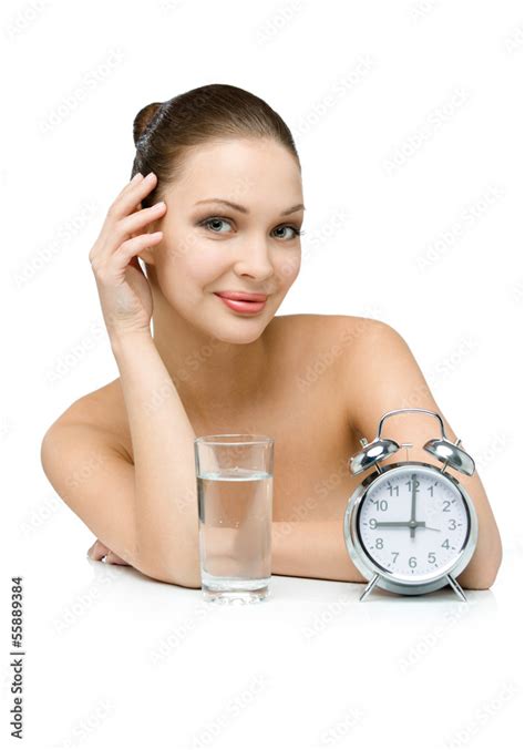 Naked Girl With Glass Of Water And Alarm Clock Stock Photo Adobe Stock