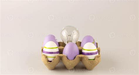 For Easter There Are Lilac Easter Eggs And A Tungsten Light Bulb In A