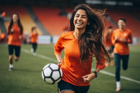 Premium Ai Image Happy Women Soccor Player Practicing On The Field At Stadium