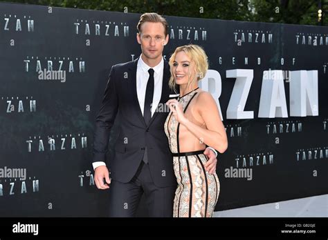 Margot Robbie And Alexander Skarsgard Attending The Legend Of Tarzan