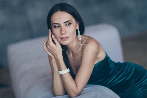 Closeup Photo Of Tenderness Lady Leaning On Comfy Sofa Looking Side