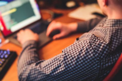 It Developer Programmer Working And Coding On His Worplace At Home