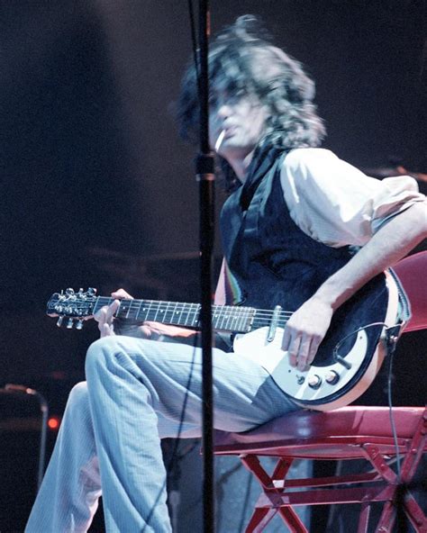 Jimmy Page Smoking During Performance On Stage At Arms Charity Concerts