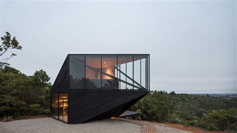 2dm Arquitectos Creates Angular Holiday Cabin On Chilean Coast 2dm Arquitectos Creates Angular Holiday Cabin On Chilean Coast
