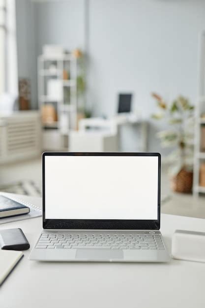 Laptop Mock Up On Desk Vertical Premium Photo