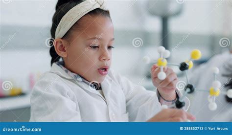 Science Education And A Girl With A Molecule Model In Class For