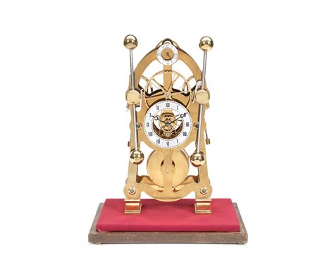 Bonhams A Brass Grasshopper Escapement Sea Clock Timepiece The
