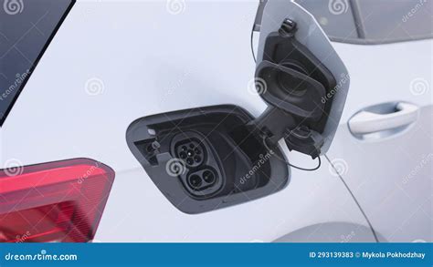 Type 2 CCS Plug Port On Electric Vehicle DC CCS Type 2 EV Charging Connector At EV Car Stock