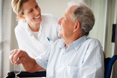 Nurse With Smiling Elderly Man Accushield
