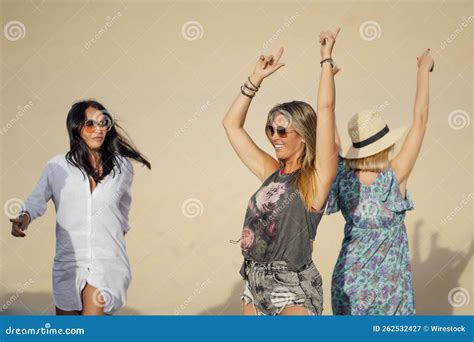 Young Spanish Girls Having Fun On A Sandy Beach Stock Image Image Of